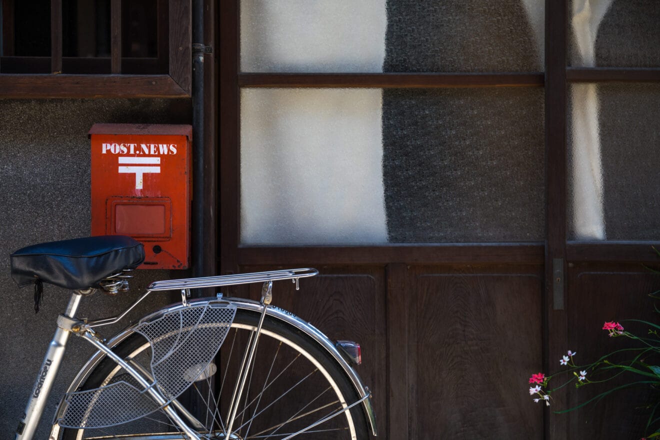 Nostalgic Japanese Streetscape with Bicycle and Blossoms | Offbeat Japan