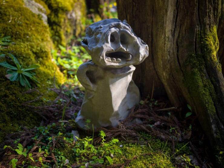 Mythical Stone Sculpture in Lush Woodland Environment | Offbeat Japan
